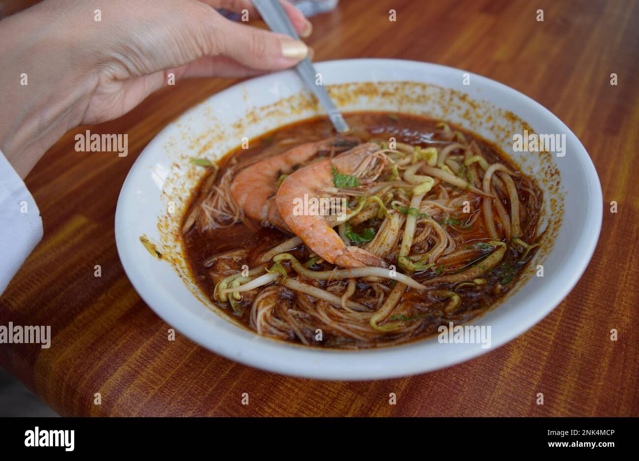 Hot spicy food person hi-res stock photography and images - Alamy