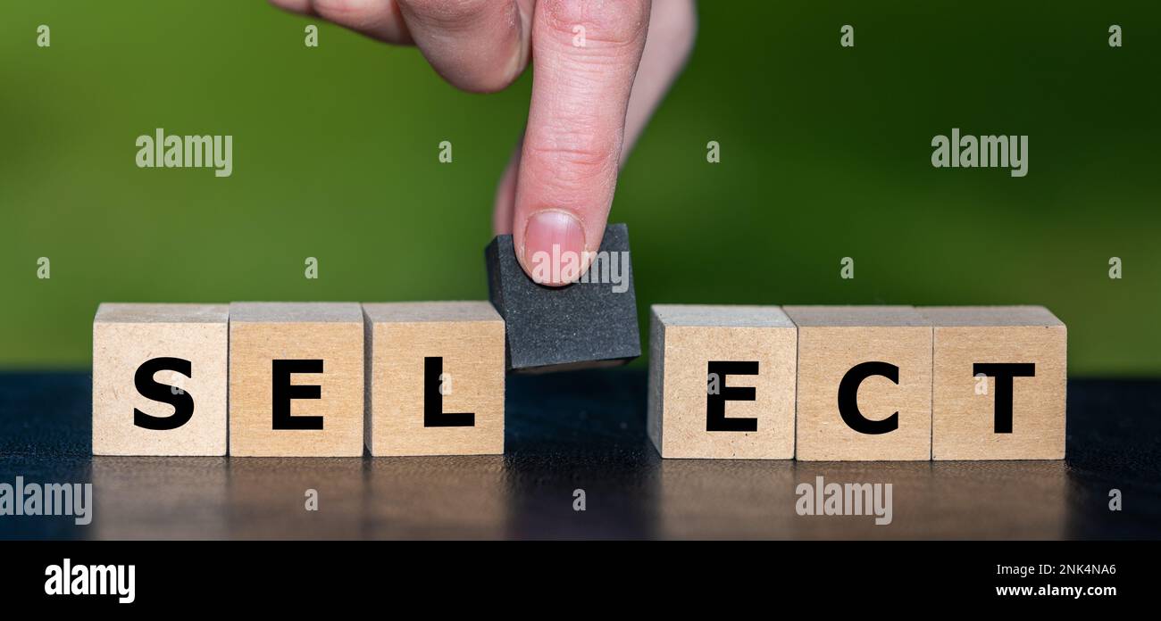 Wooden cubes form the word select Stock Photo - Alamy