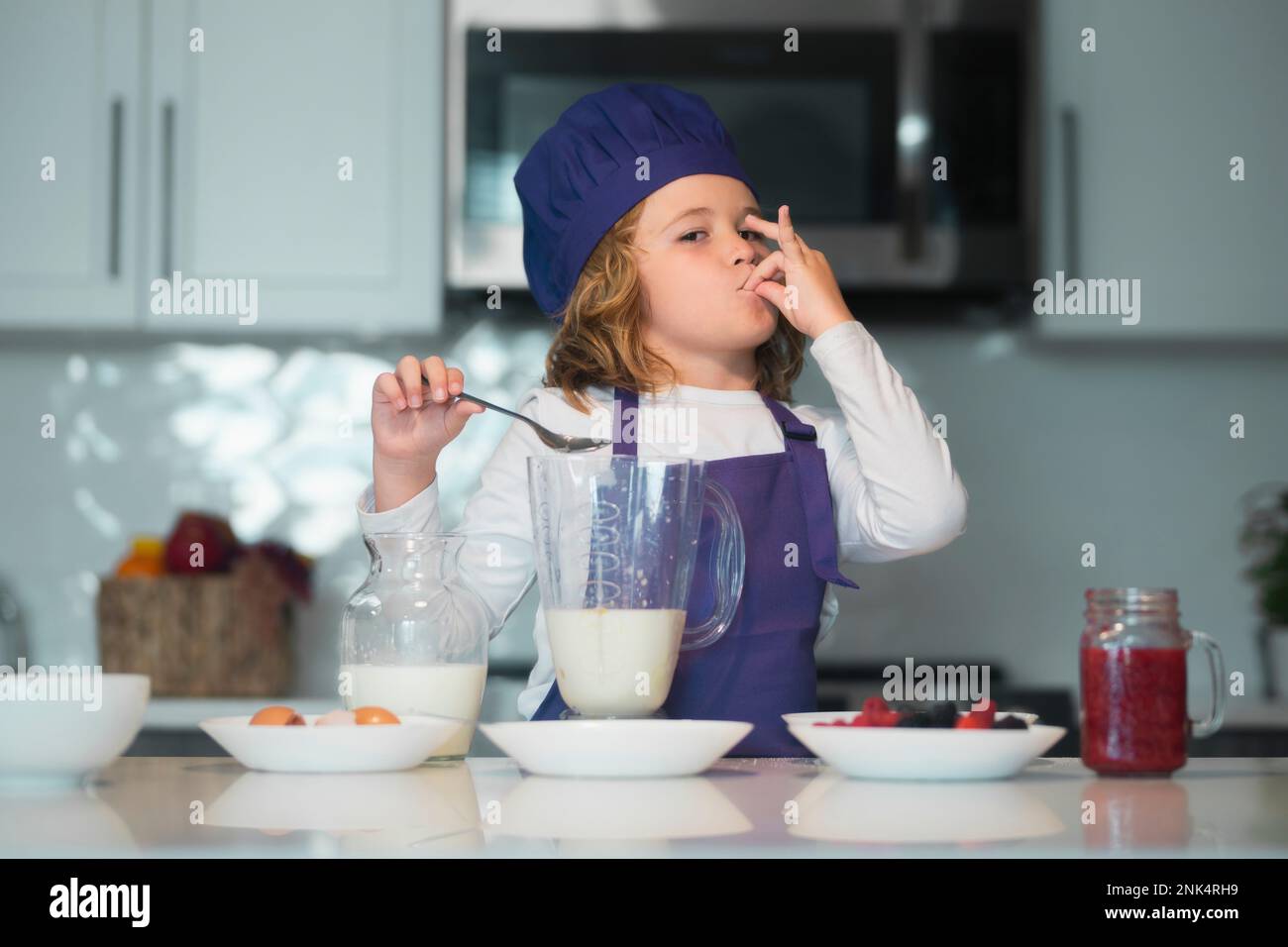 Chef child cooking healthy meal and dinner preparation. Child chef ...