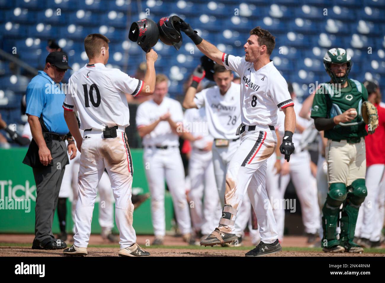 Cincinnati Bearcats Griffin Merritt (8) celebrates a 2-run home run ...