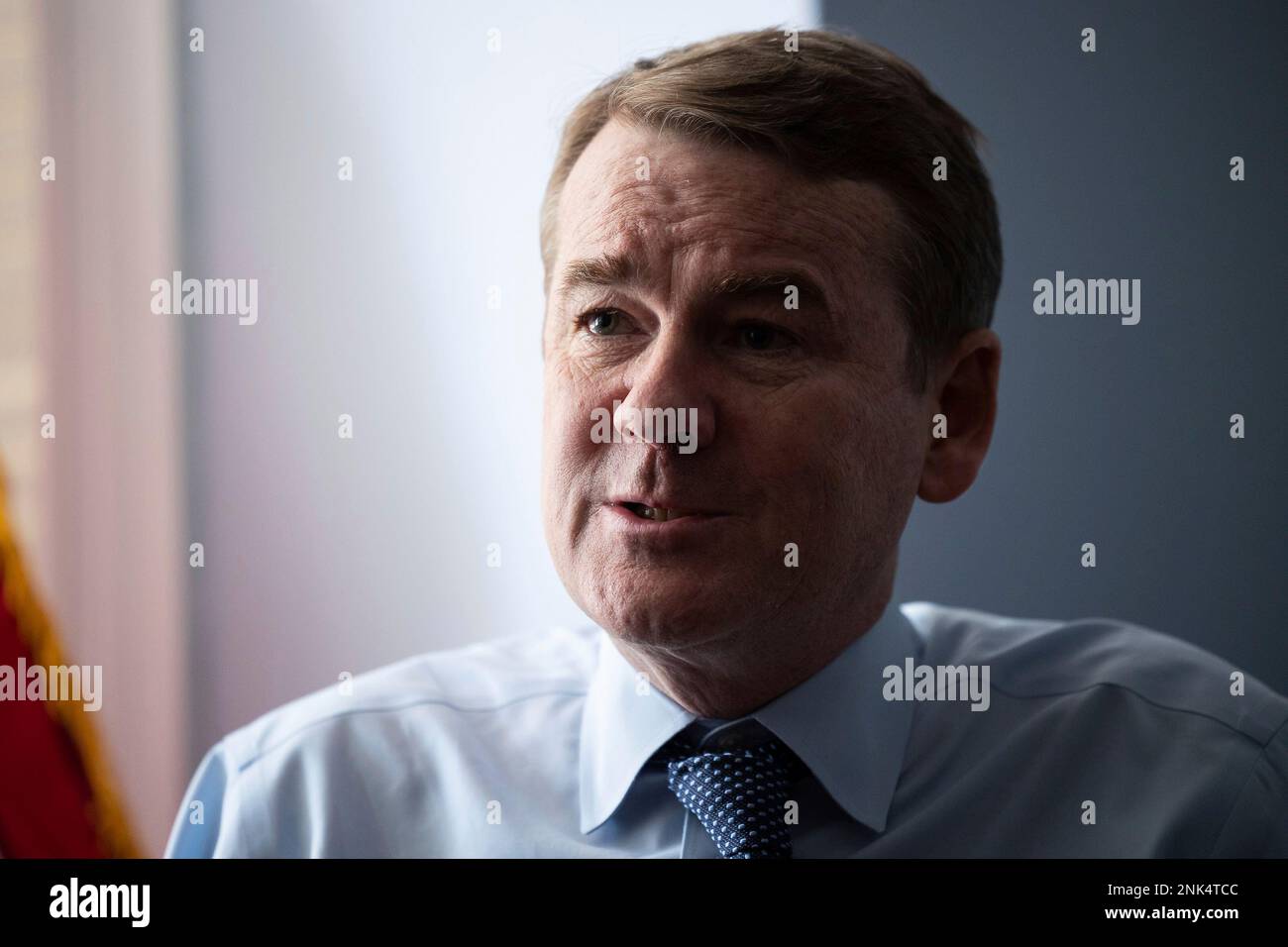 Sen. Michael Bennet (D-Colo.) gives an interview at Democratic ...