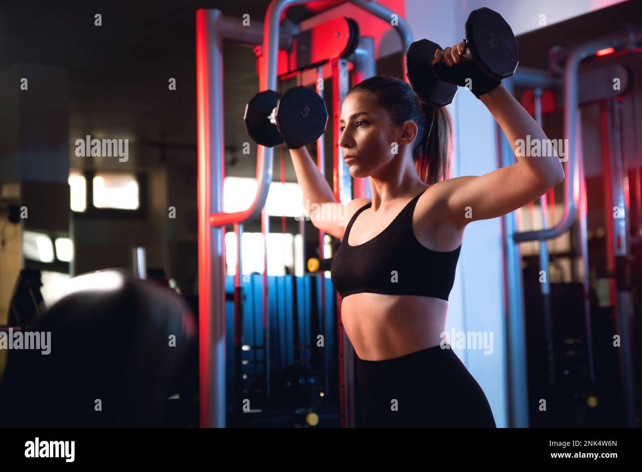 Portrait of a 30s Turkish woman with black tops and tights doing ...