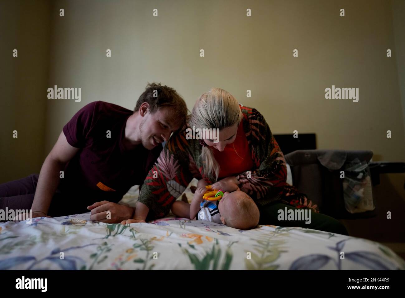 Russian nationals Alla Prigolovkina and her husband Andrei Ushakov look at their Argentine-born ...