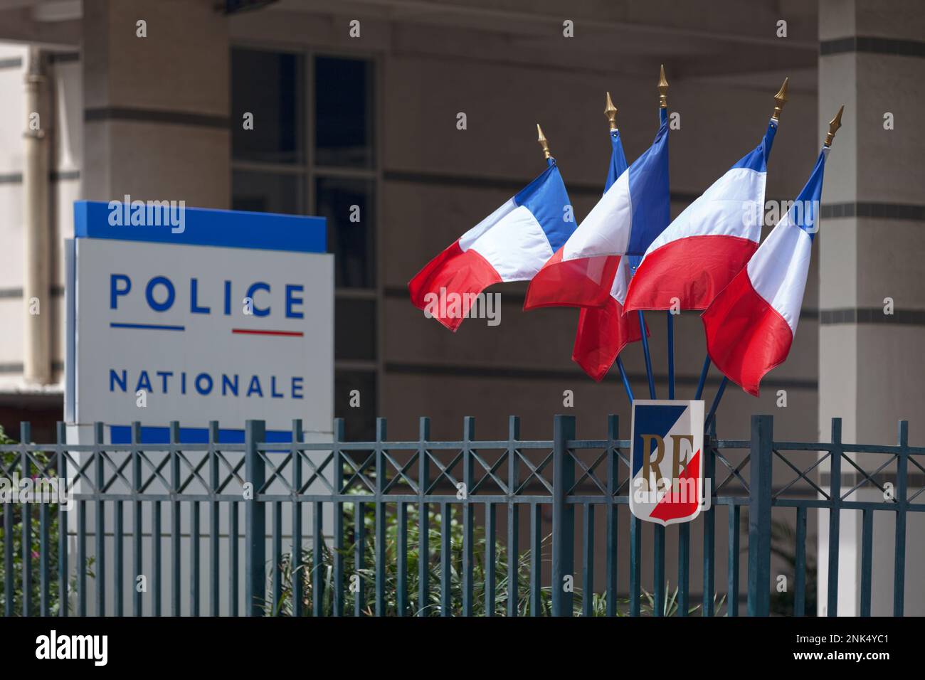 Frontgate of a police station with the French flag alongside the Police ...