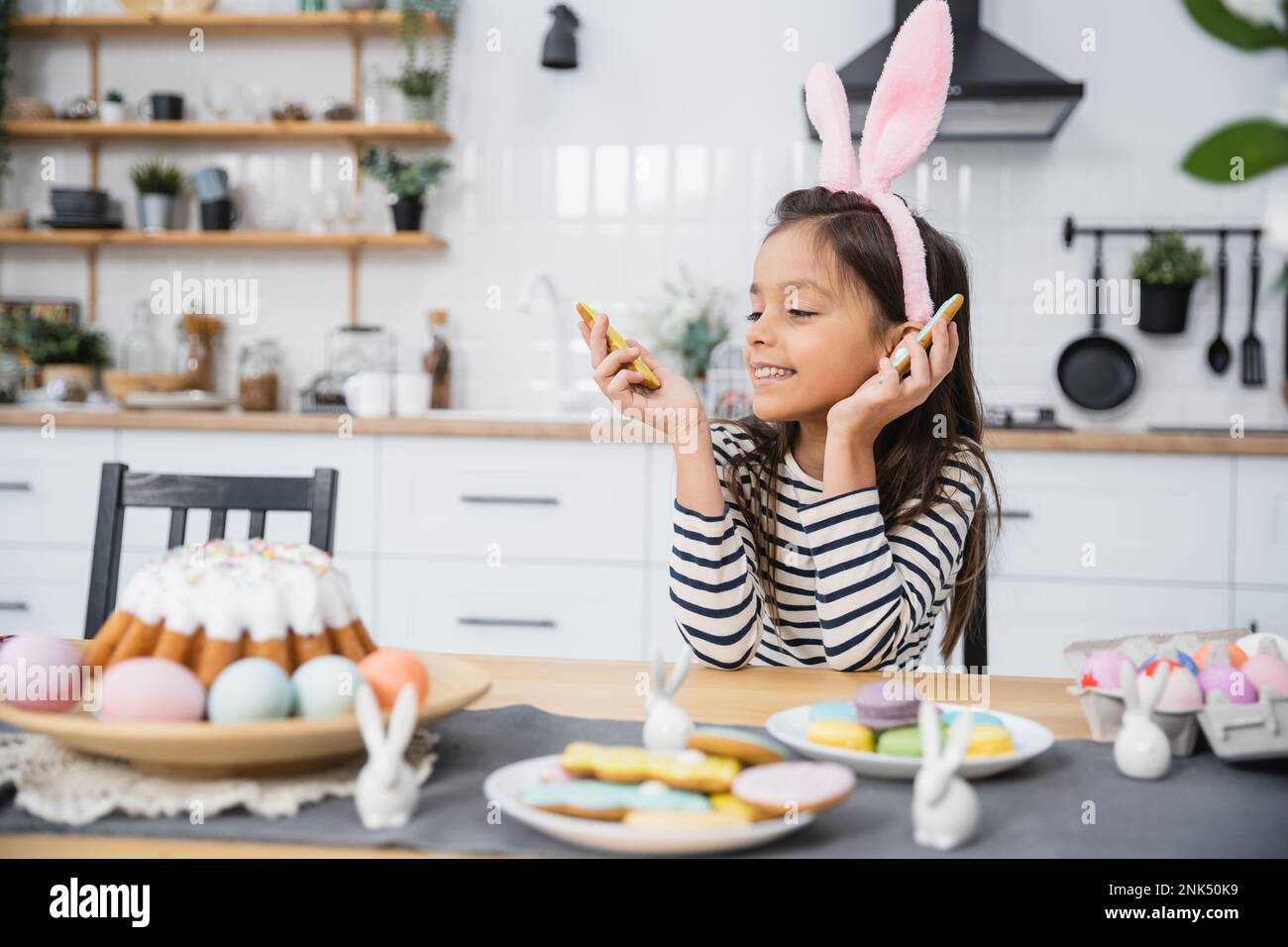 Child looking at cake and eggs hi-res stock photography and images - Alamy