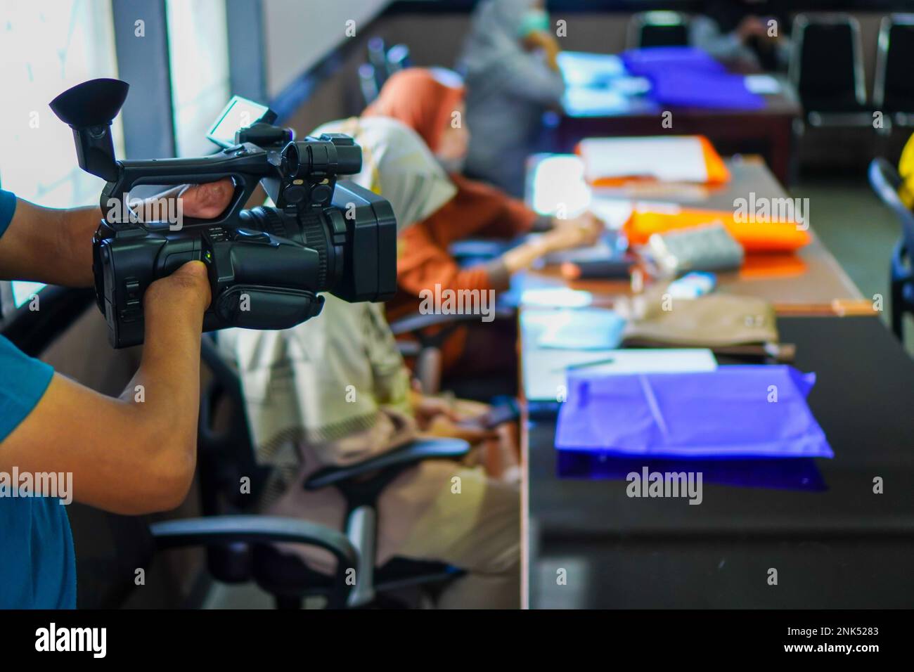 Disabled photographer. People with disabilities are using a camera ...