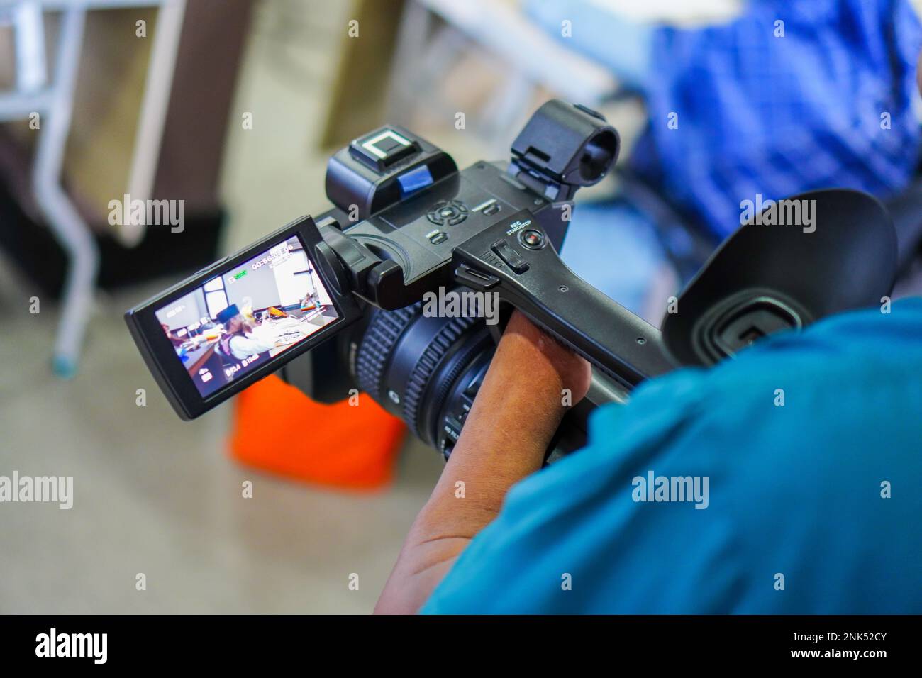 Disabled photographer. People with disabilities are using a camera ...