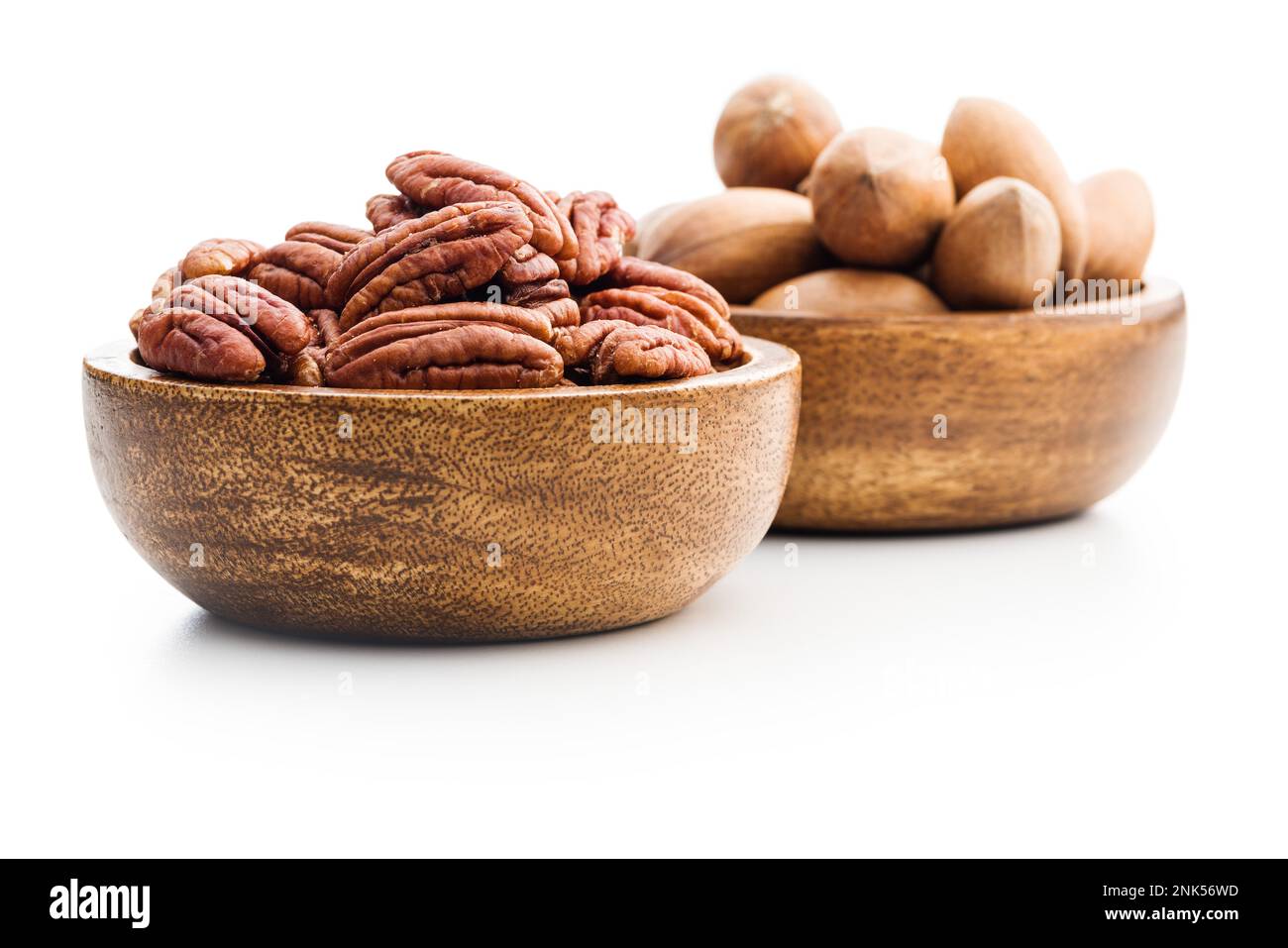 Peeled pecan nuts in bowl isolated on the white background Stock Photo ...