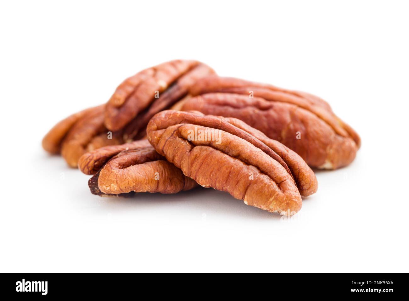 Peeled pecan nuts isolated on the white background Stock Photo - Alamy