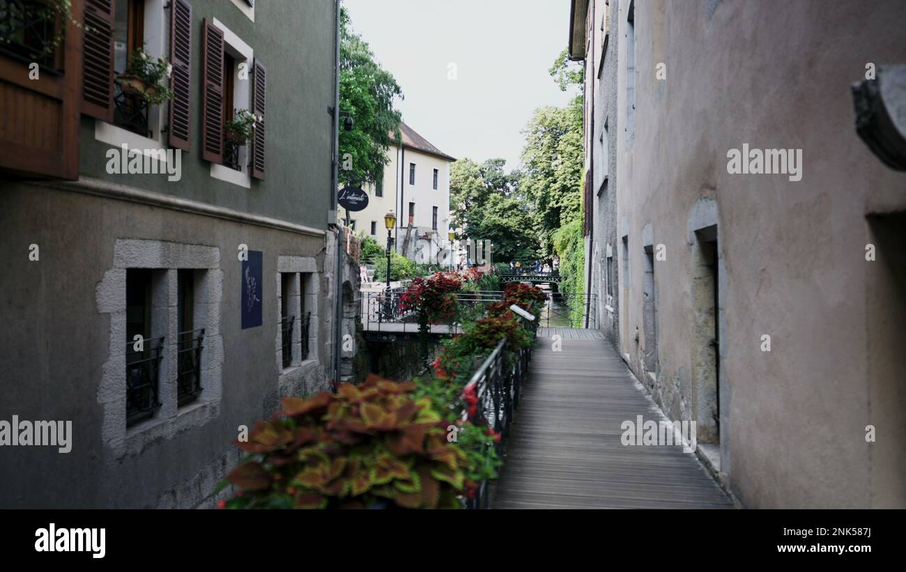 Charming traditional French street in Annecy. Old antique European ...