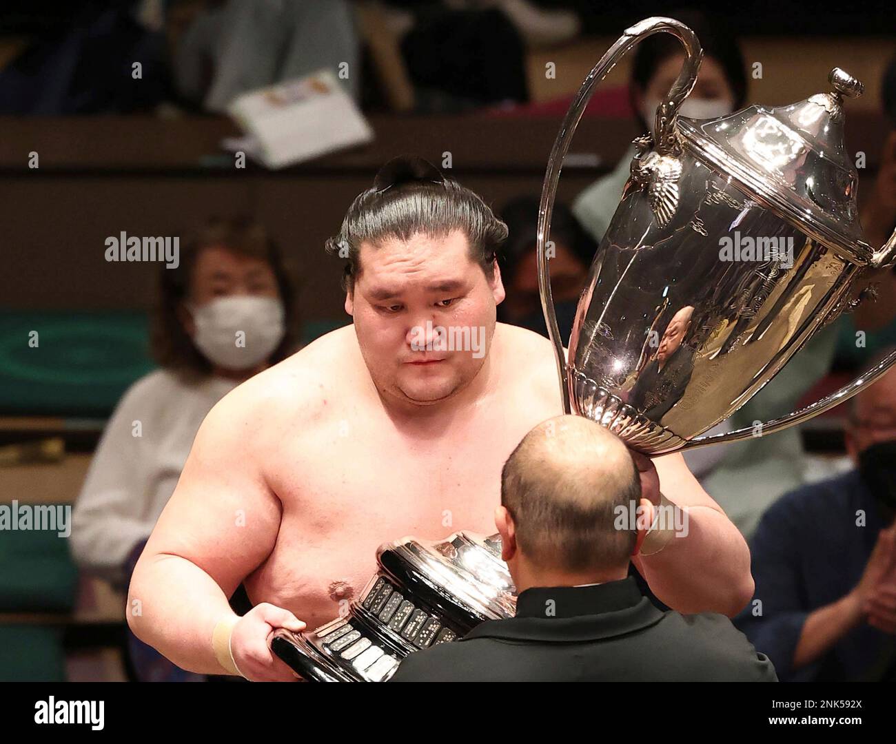 Yokozuna Terunofuji receives the trophy after winning the May Grand ...