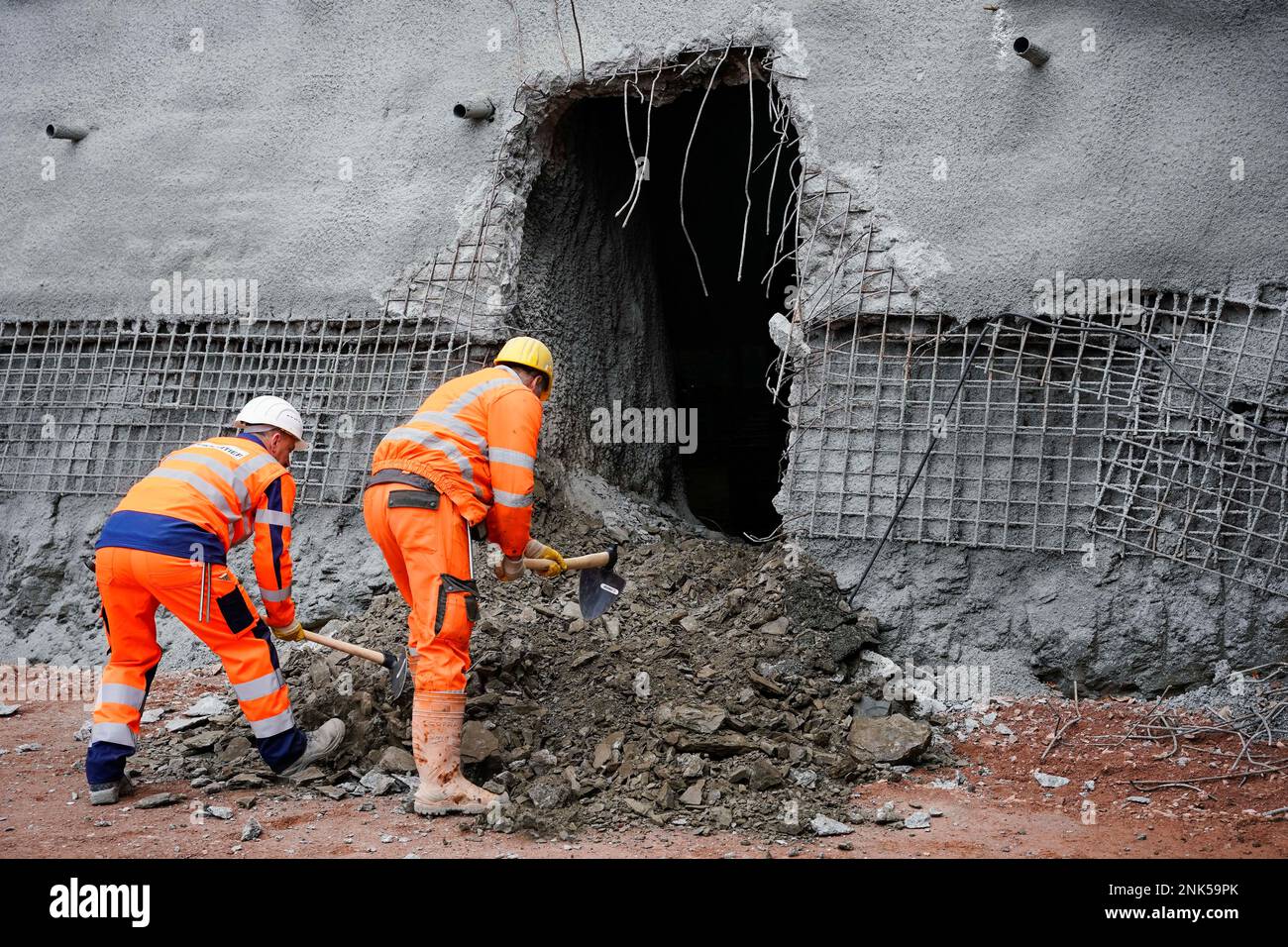 Imsweiler, Germany. 23rd Feb, 2023. Two construction workers clear away ...