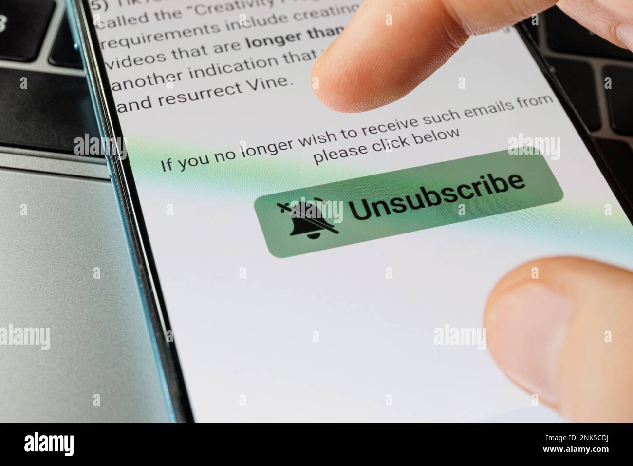 Unsubscribe button on smartphone. Unsubscribe of newsletters Stock ...