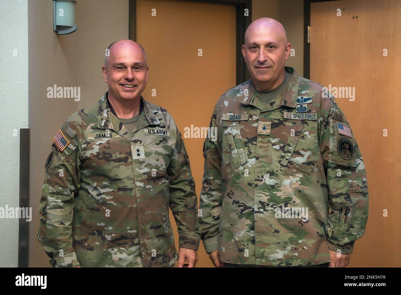 U.S. Army Maj. Gen. Tom James, left, commander of the Joint Task Force ...