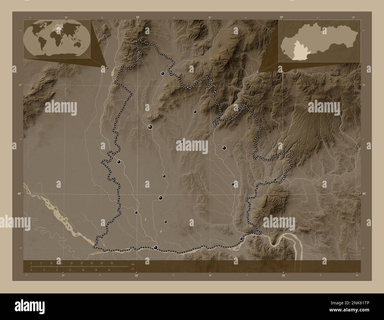 Nitriansky, region of Slovakia. Elevation map colored in sepia tones ...