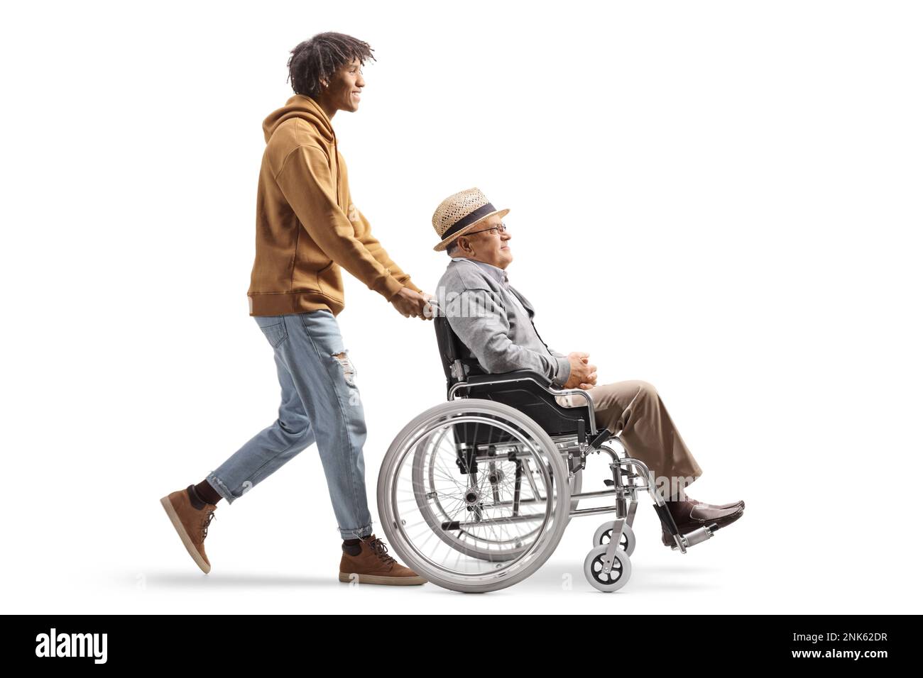 Full length profile shot of an african american young man pushing an ...