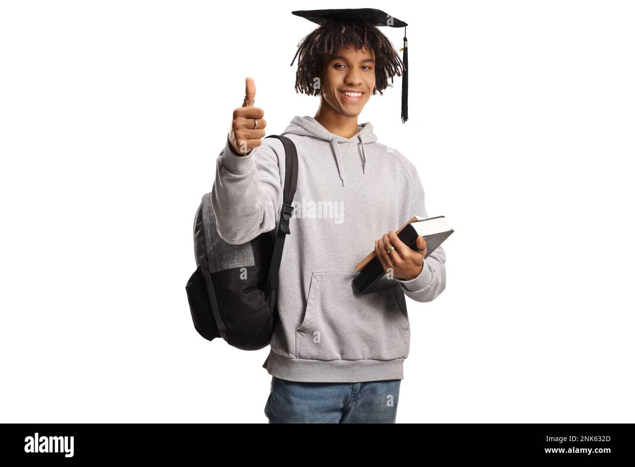 African american male student with a graduation hat gesturing thumbs up ... African american male student with a graduation hat gesturing thumbs up ...