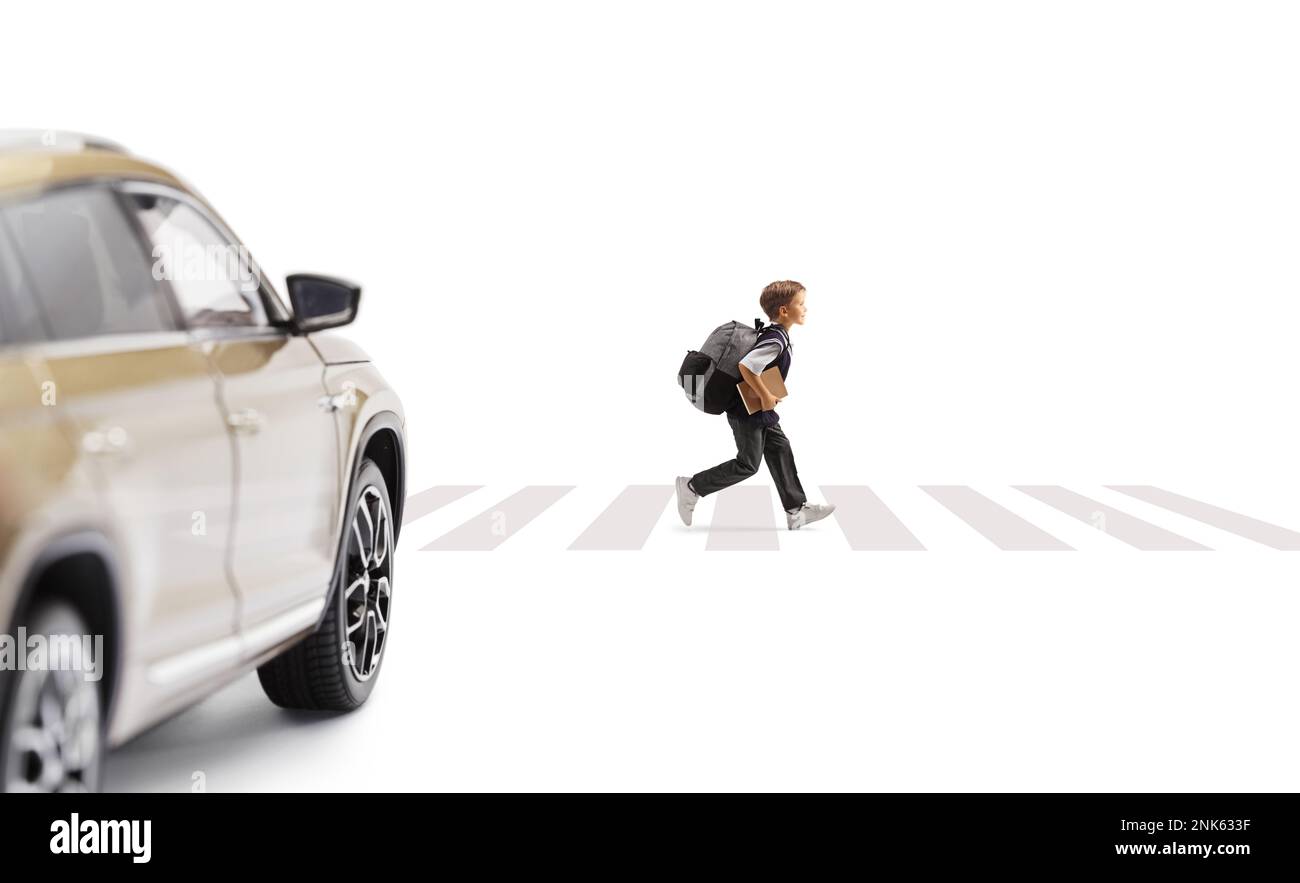 Boy running at a pedestiran crossing and car approaching isolated on ...