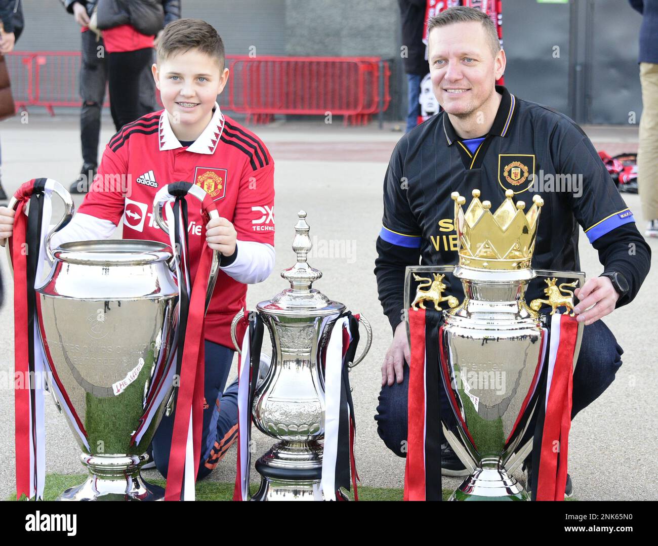 Manchester, UK, 23rd February, 2023. Football fans pose with replicas ...