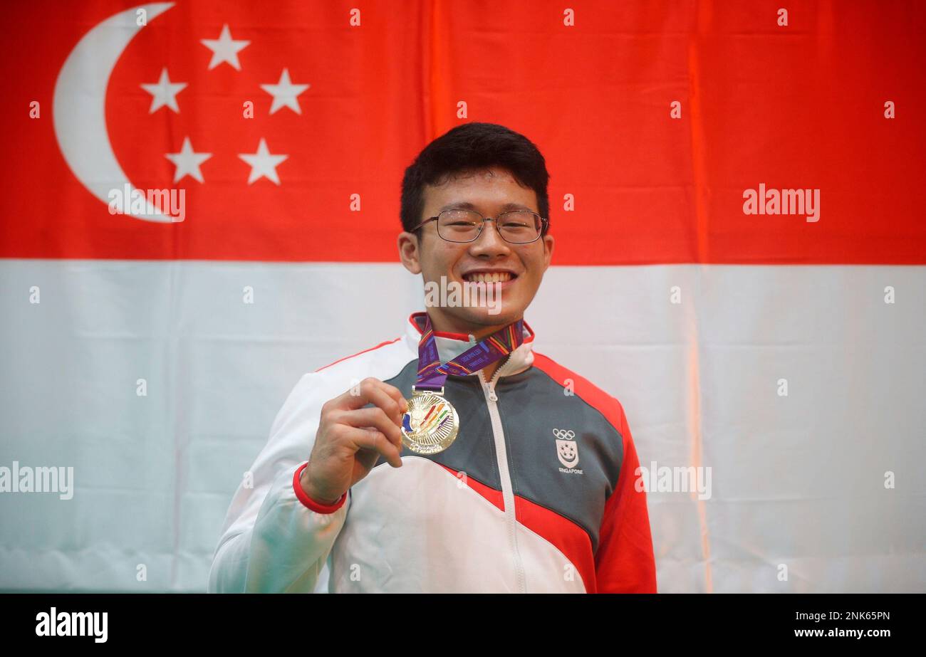 Noah Lim poses with the gold medal he won in the ju-jitsu men's 69kg ...