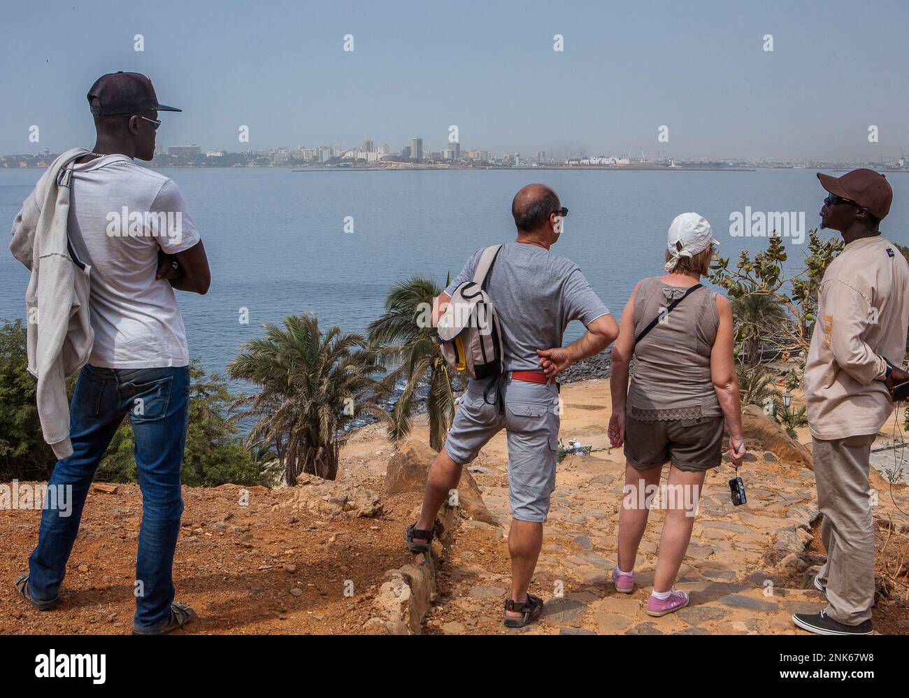 Tourist in the top of Goree island, Dakar in background, Senegal Stock ...
