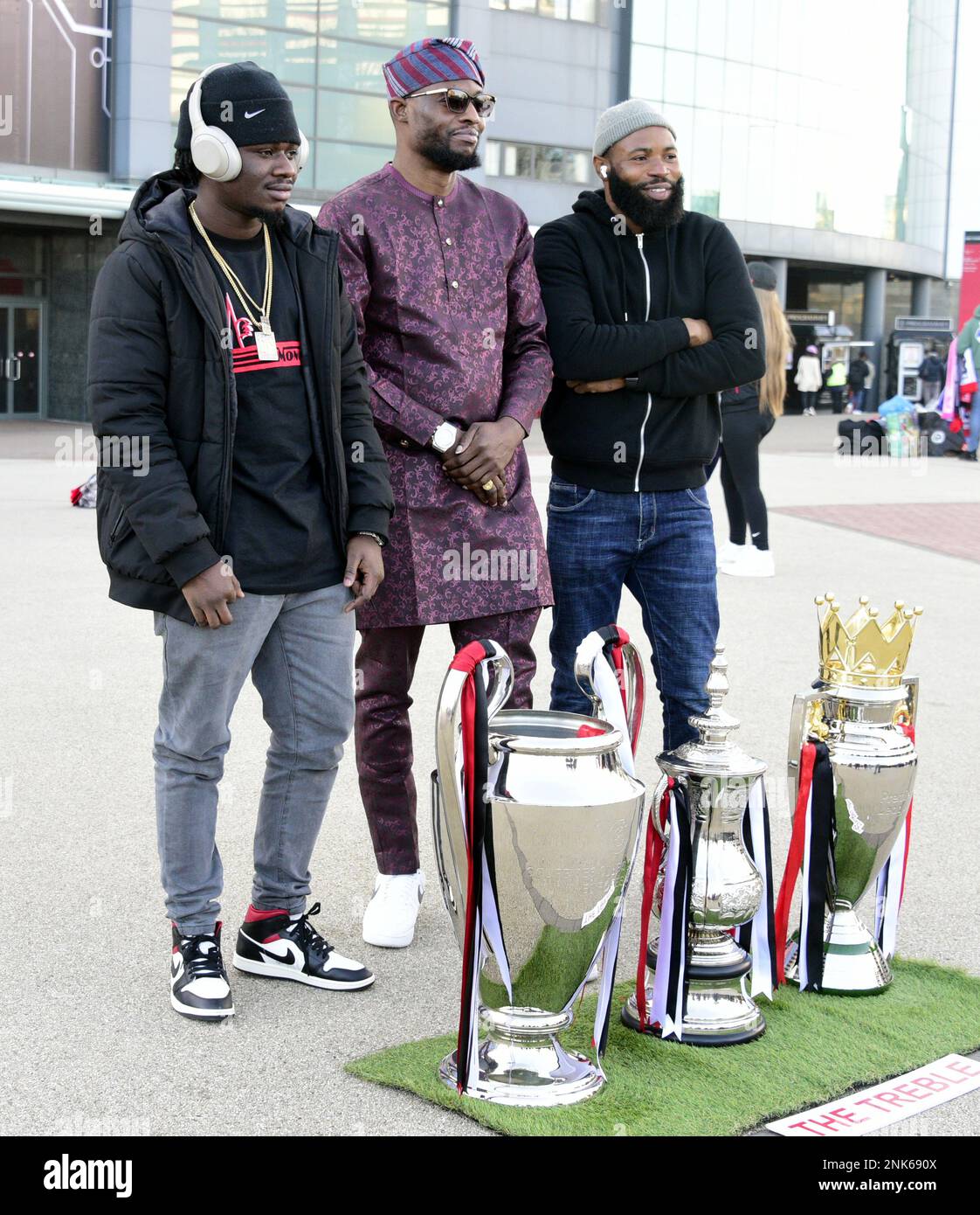 Manchester, UK, 23rd February, 2023. Football fans pose with replicas ...