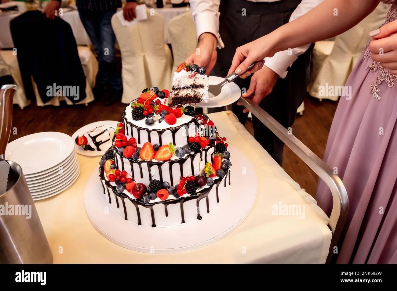 cutting a cake sweets, cake and cookies Stock Photo - Alamy