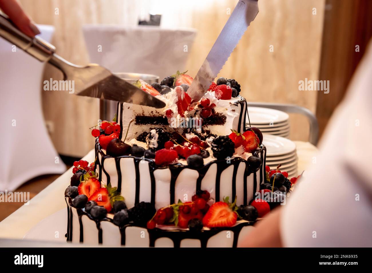 cutting a cake sweets, cake and cookies Stock Photo - Alamy