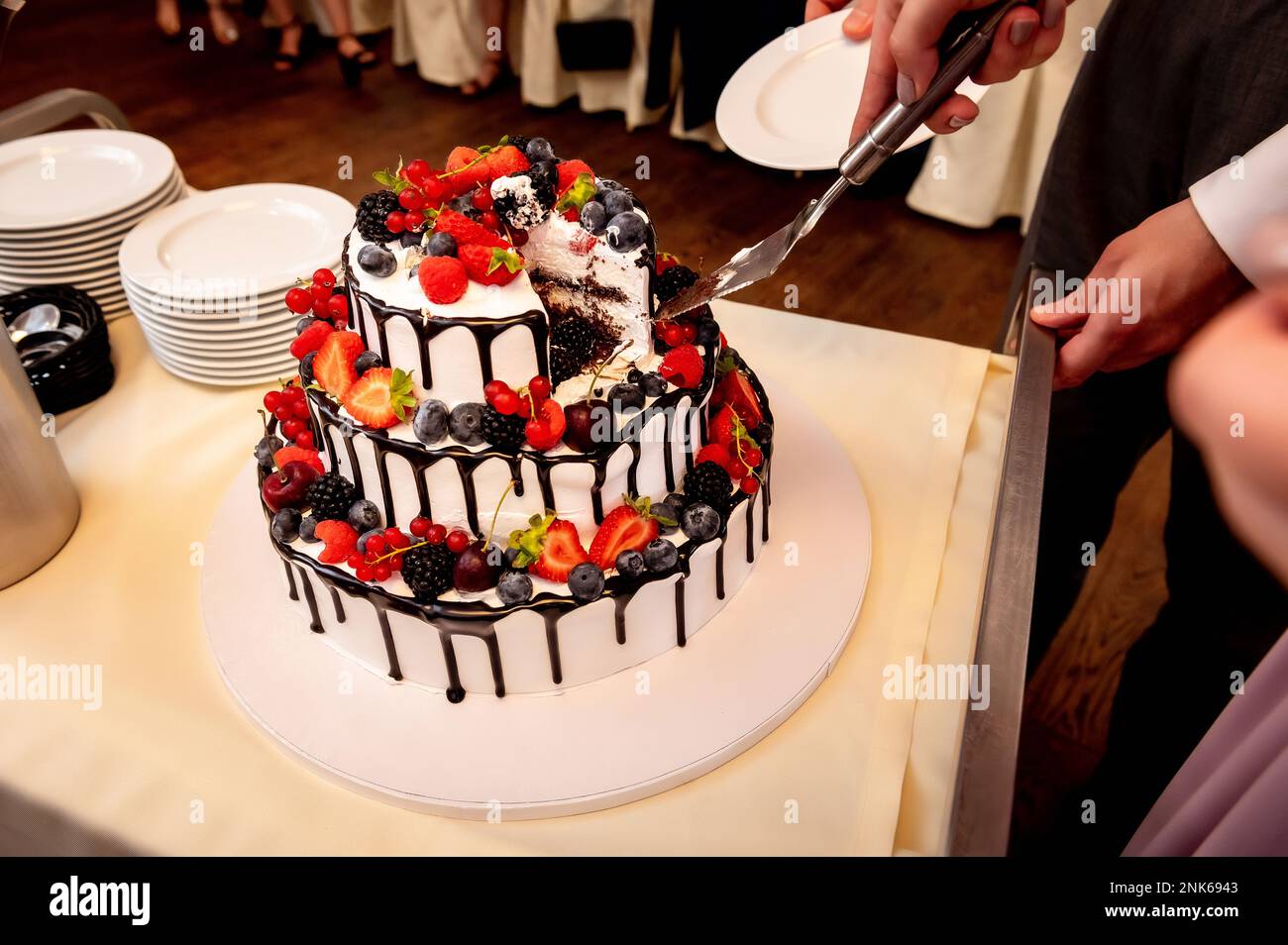 cutting a cake sweets, cake and cookies Stock Photo - Alamy