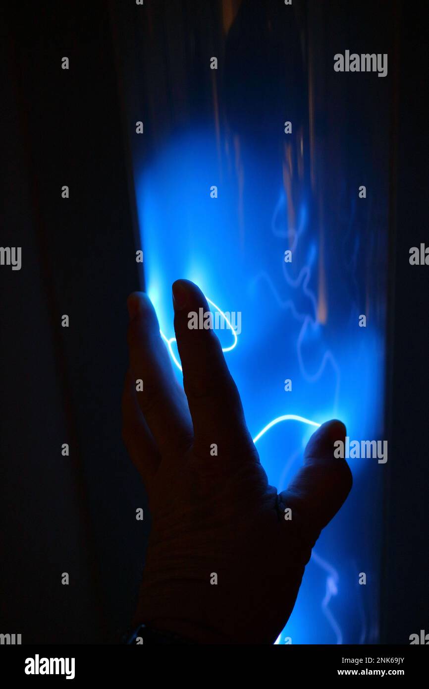 Blue hand grabs hi-res stock photography and images - Alamy