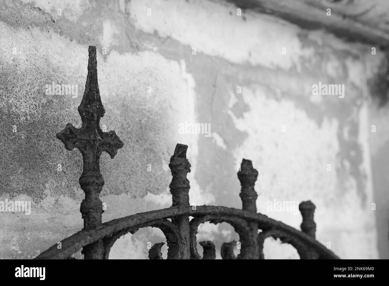 Vintage traditional rusty metal fence with sharp points as a protection ...