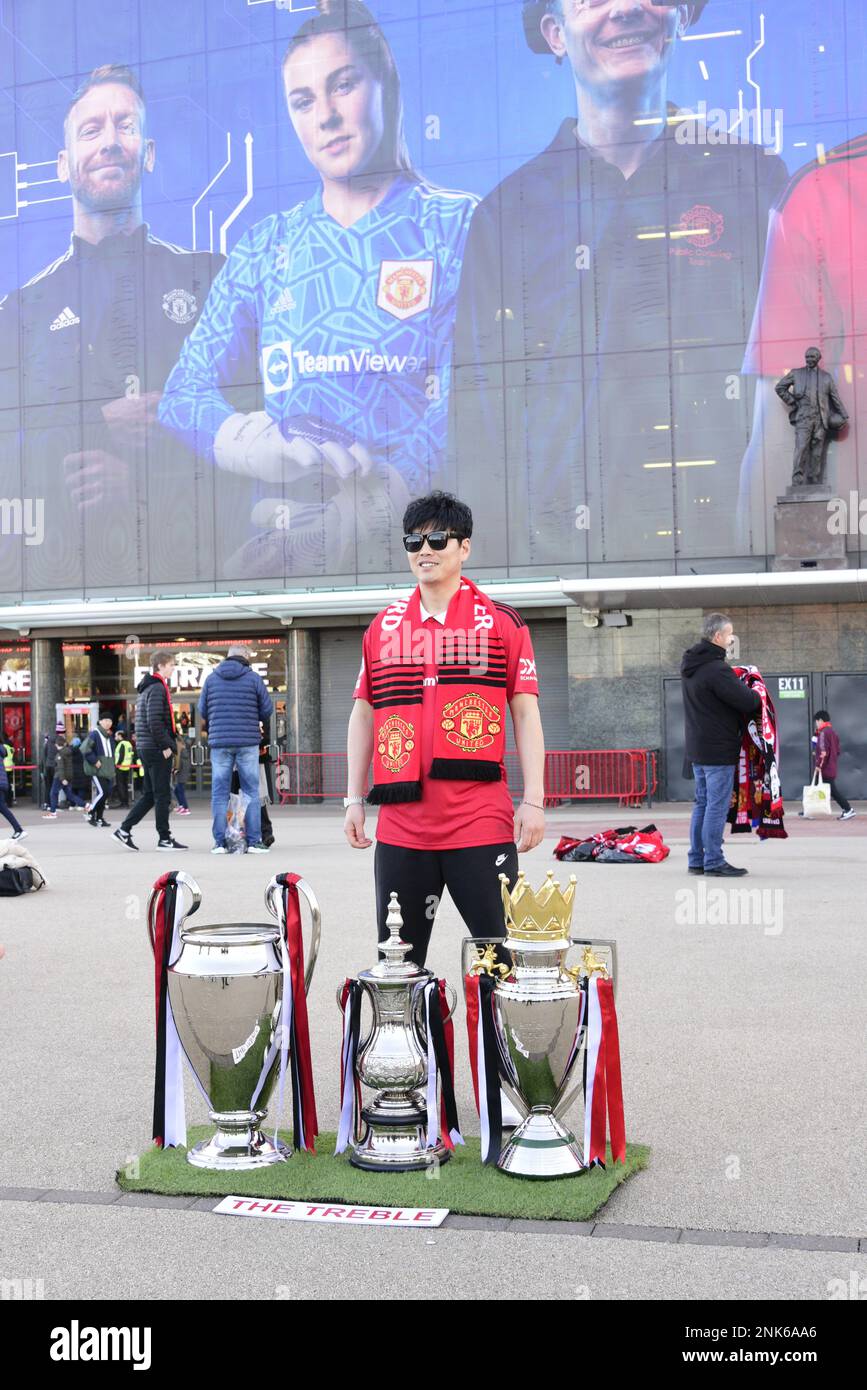 Manchester, UK, 23rd February, 2023. Football fans pose with replicas ...