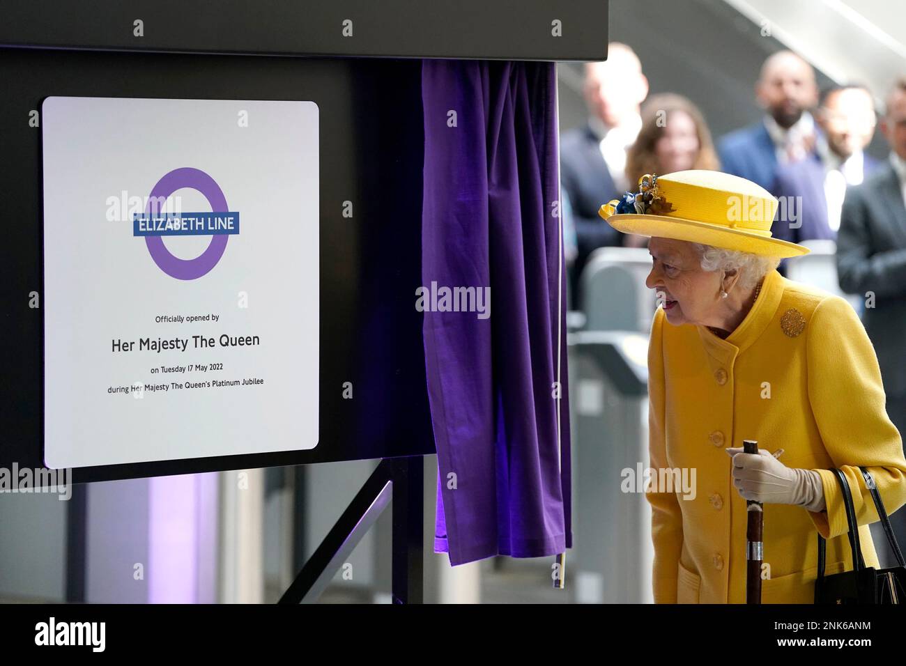 Britain's Queen Elizabeth II unveils a plaque to mark the Elizabeth ...