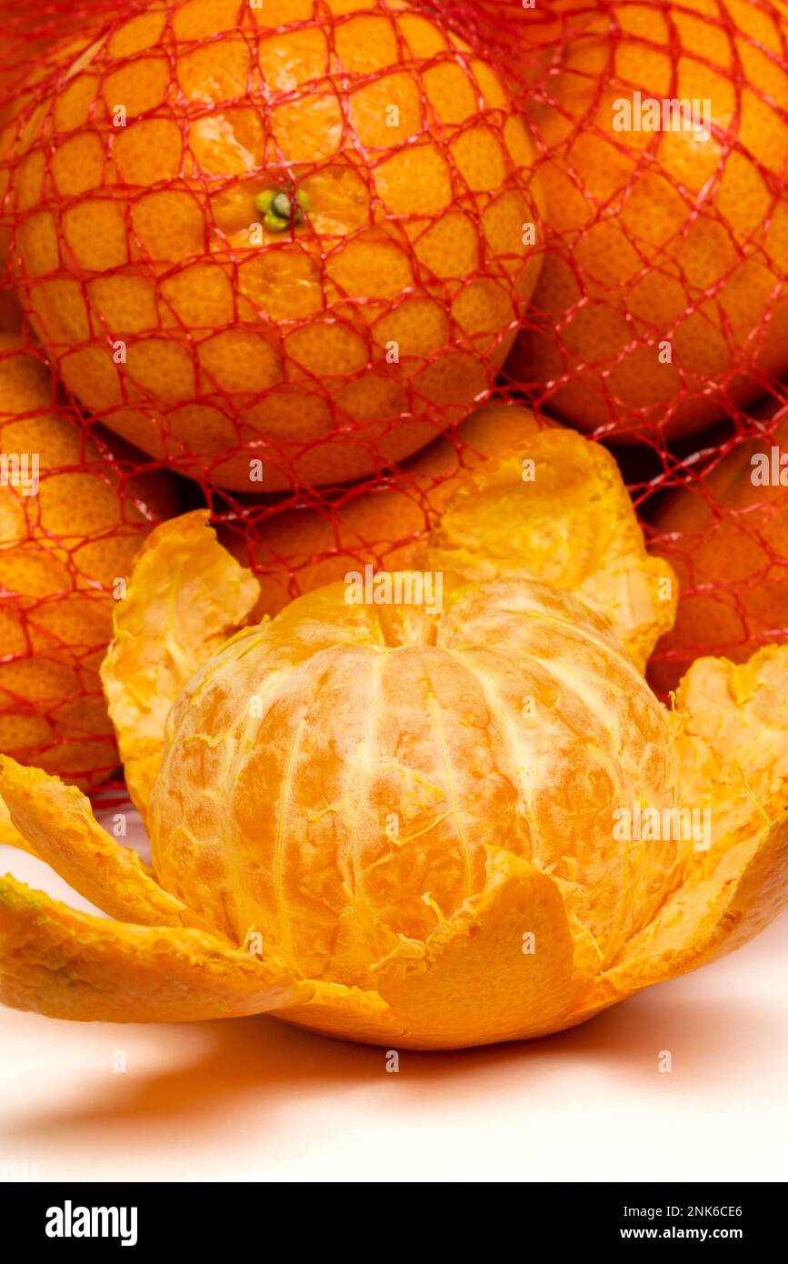 A Mandarin Orange Peeled Open Stock Photo - Alamy