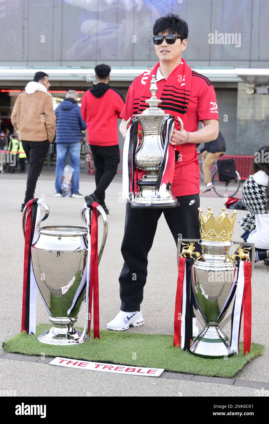 Manchester, UK, 23rd February, 2023. Football fans pose with replicas ...