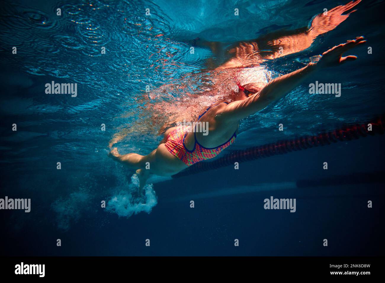 Muscular athlete. Competitive woman, professional female swimmer ...