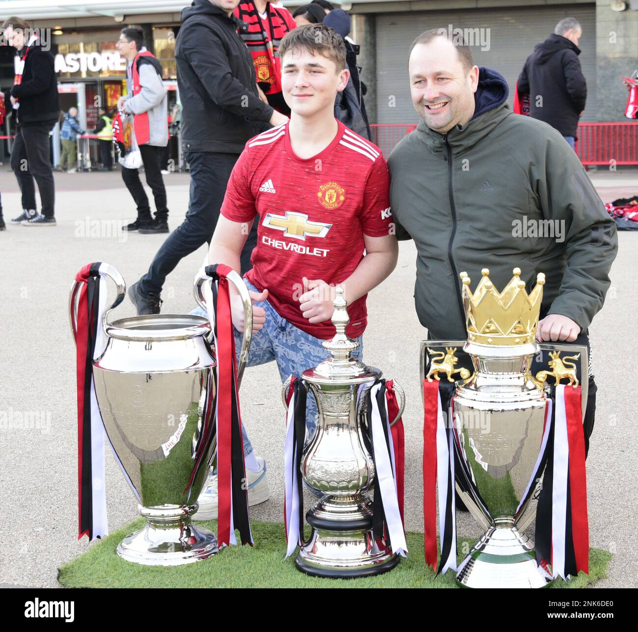 Manchester, UK, 23rd February, 2023. Football fans pose with replicas ...