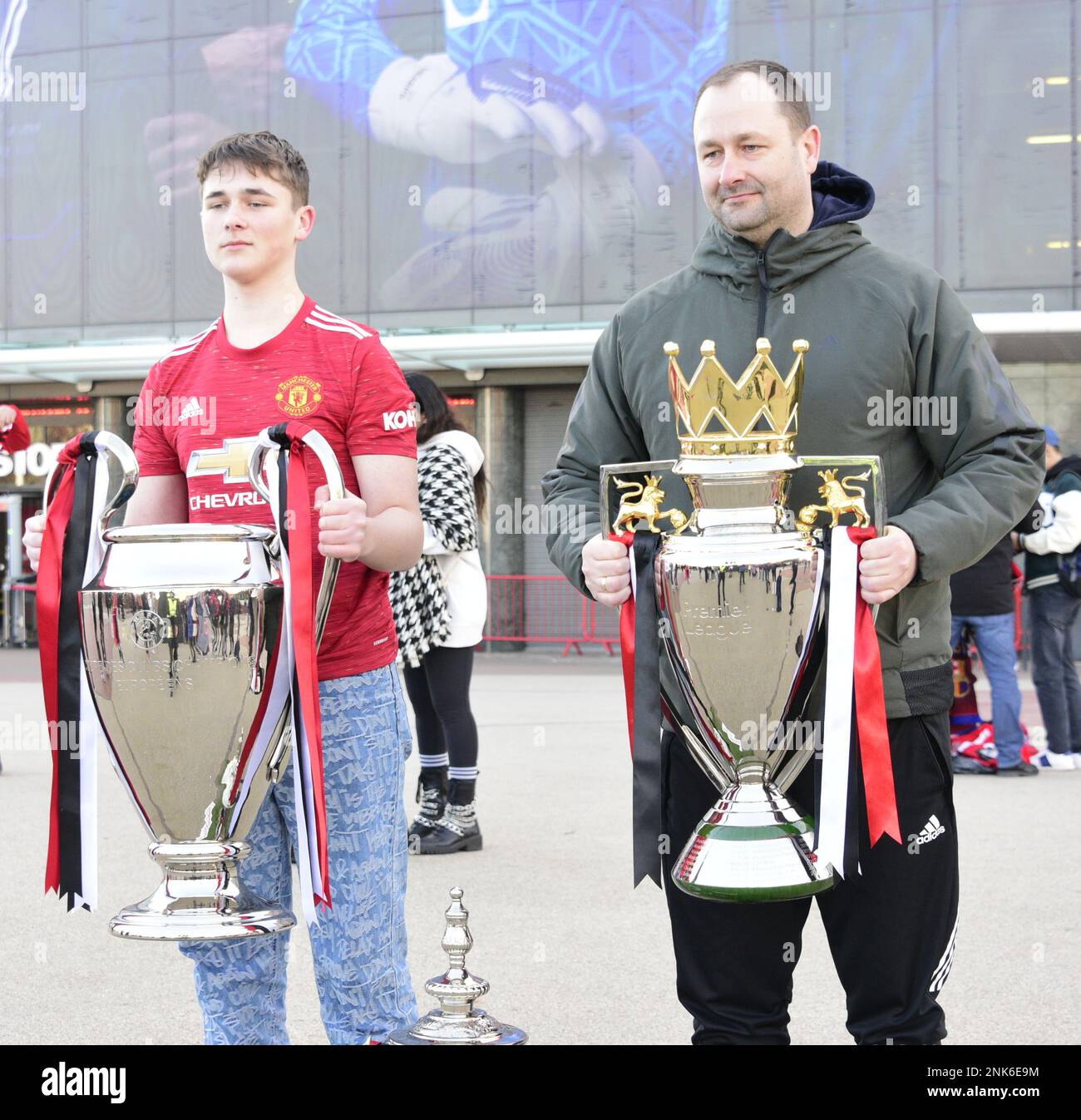 Manchester, UK, 23rd February, 2023. Football fans pose with replicas ...