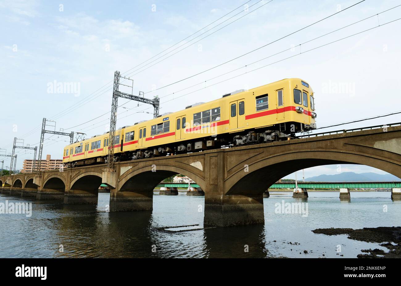 600 series train of the Nishitetsu Kaizuka Line crosses 10 arches bridg ...