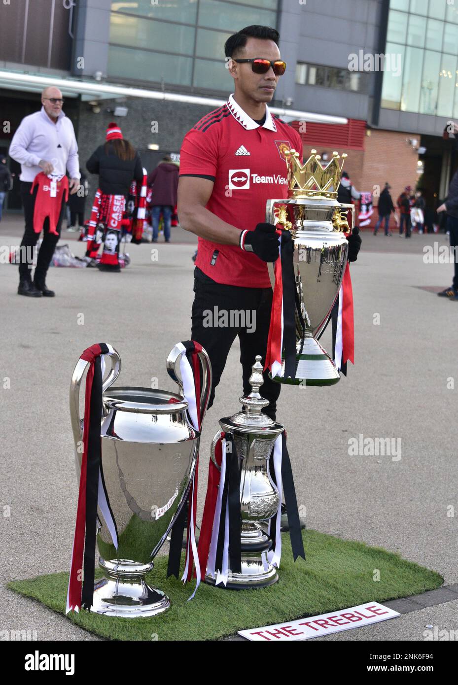 Manchester, UK, 23rd February, 2023. Football fans pose with replicas ...