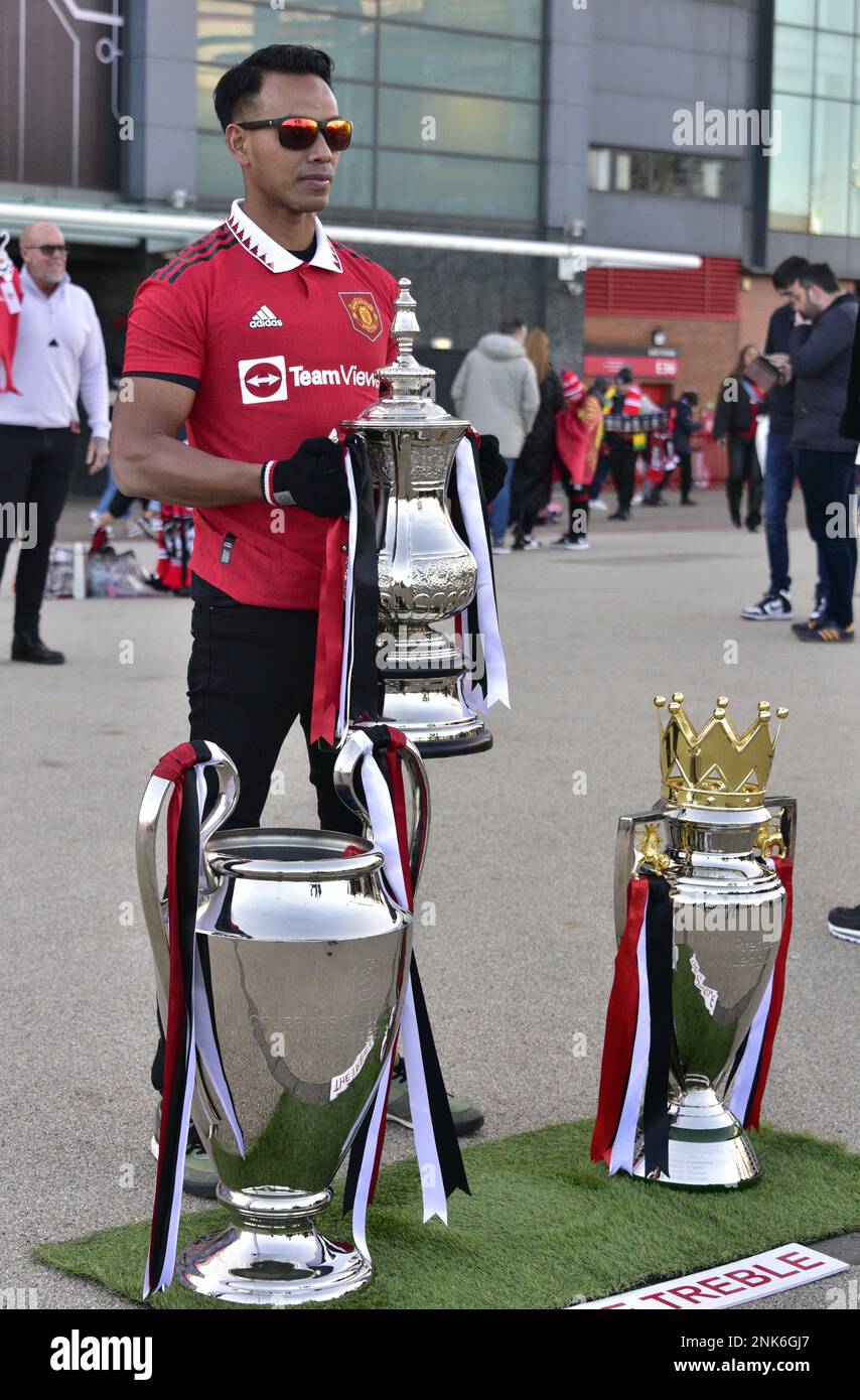 Manchester, UK, 23rd February, 2023. Football fans pose with replicas ...