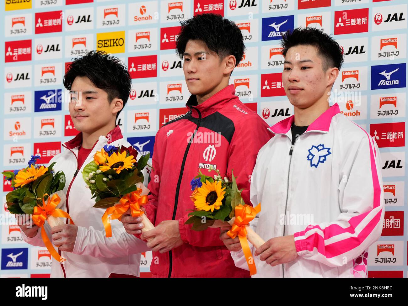 (l-R) Yuya Kamoto, 2nd, Daiki Hashimoto, winner, and Ryosuke Doi pose during the award ceremony ...