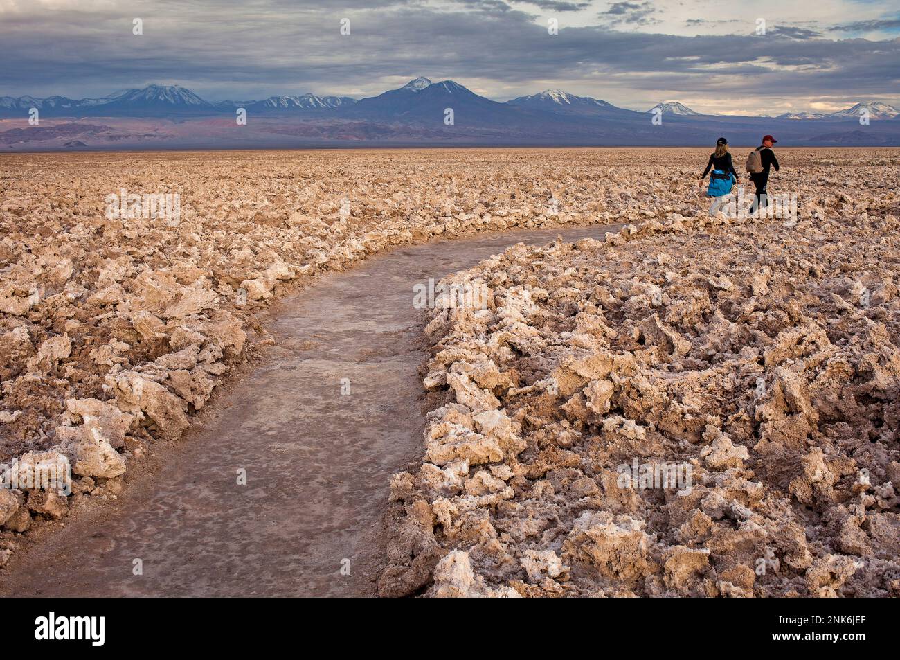 Path across Salt formations in Atacama Salt Flat,in background the ...