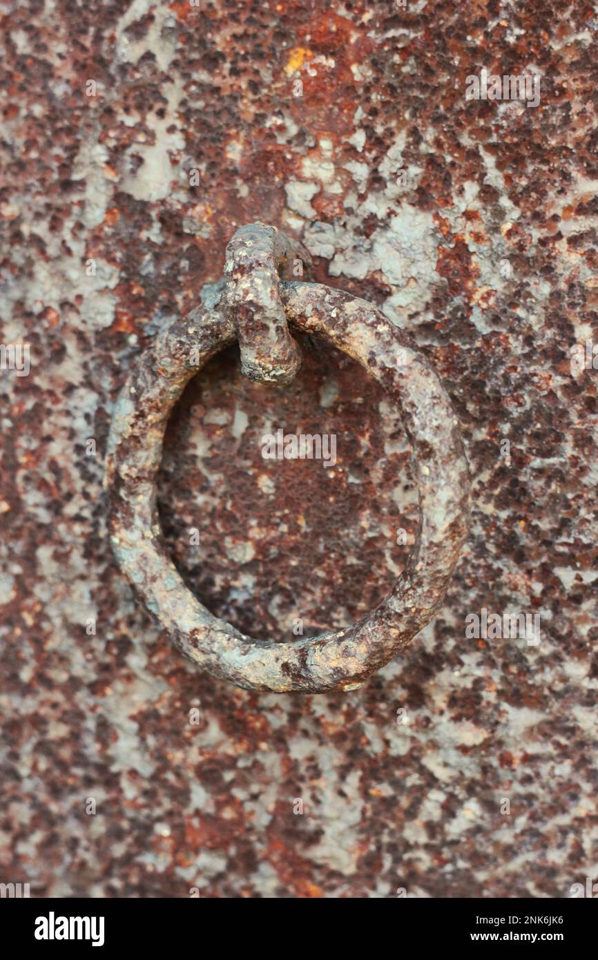 Medieval loop door handle with lots of iron and rust Stock Photo - Alamy
