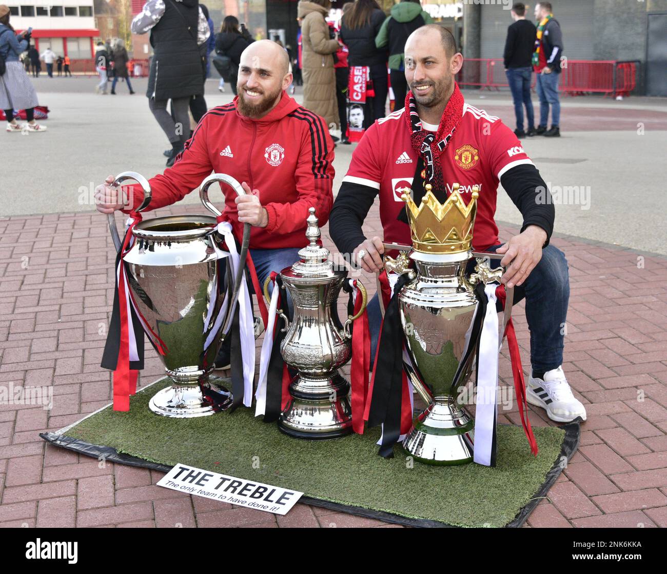 Manchester, UK, 23rd February, 2023. Football fans pose with replicas ...
