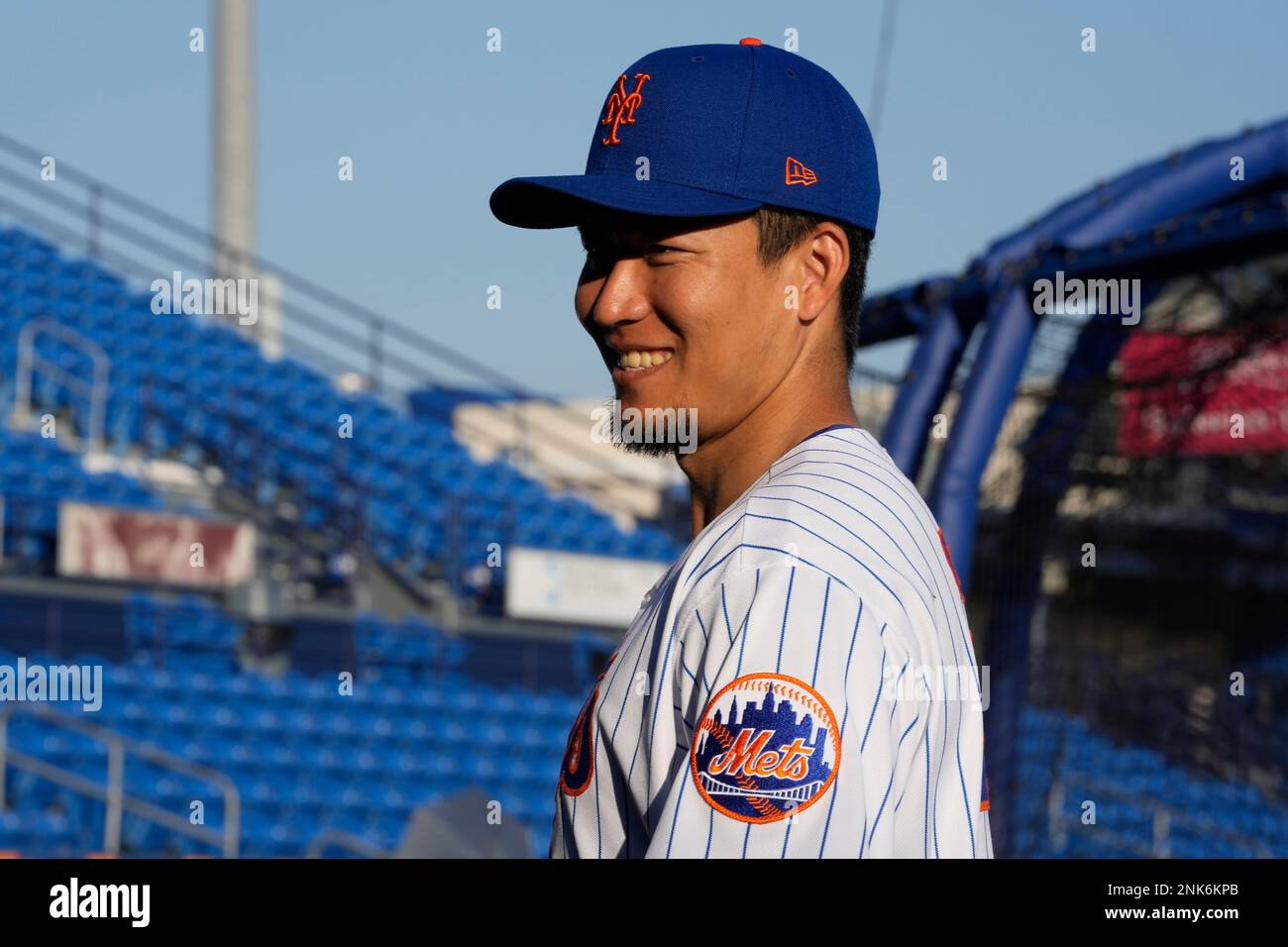 New York Mets pitcher Kodai Senga poses for a photographer during photo ...