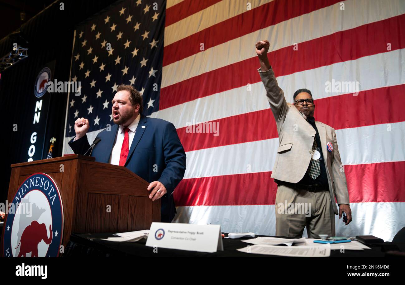 GOP gubernatorial candidate Mike Murphy, left, speaks as his running ...