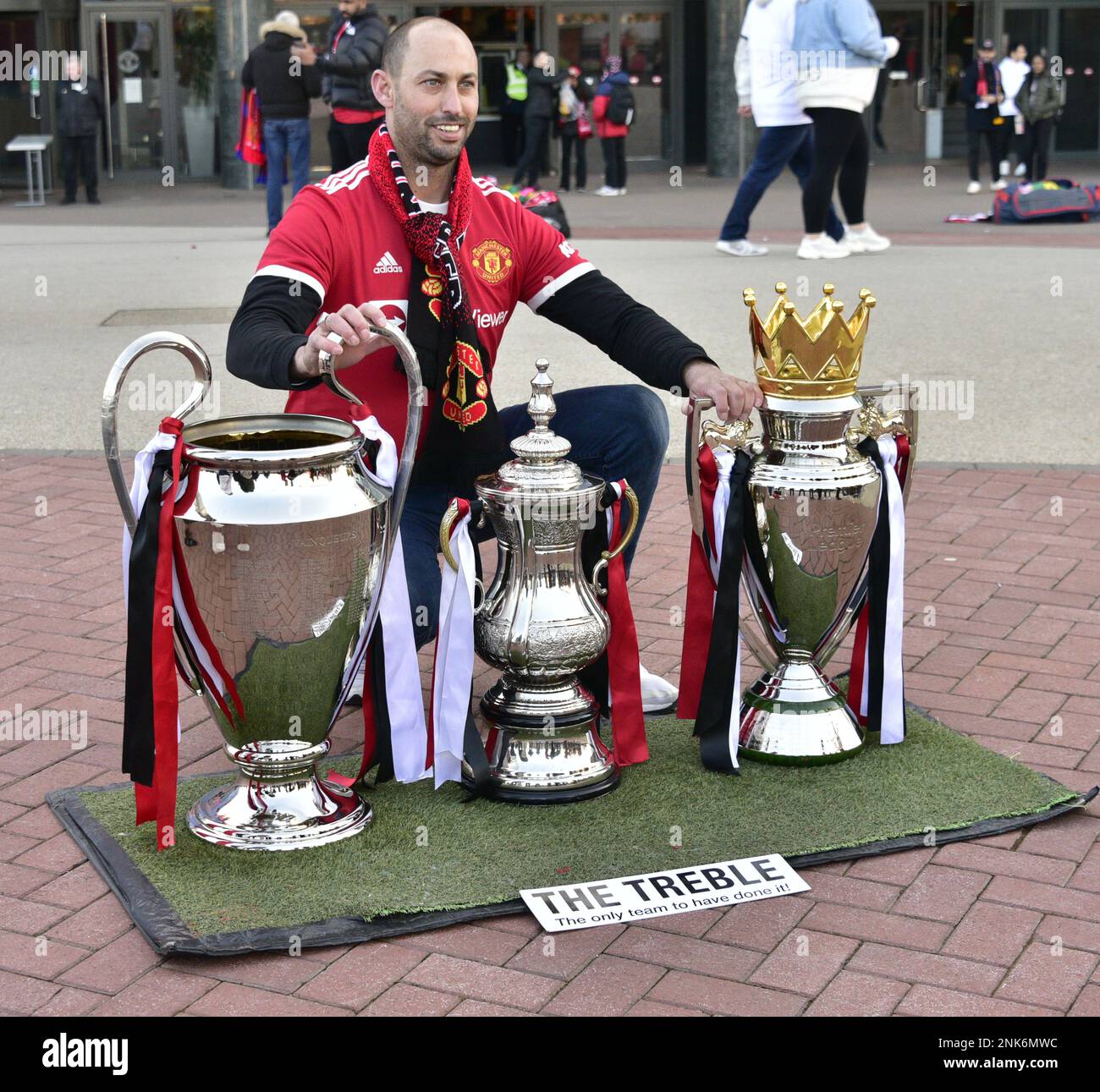 Manchester, UK, 23rd February, 2023. Football fans pose with replicas ...