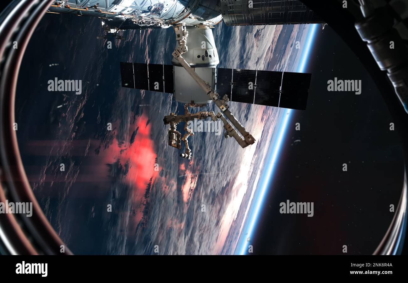 ISS in orbit of planet Earth. View from porthole. Solar system Stock ...