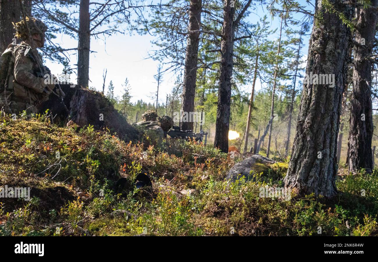 U.S. Army Spc. Nicholas Ruey and Pfc. Delroy Holness, center, both ...